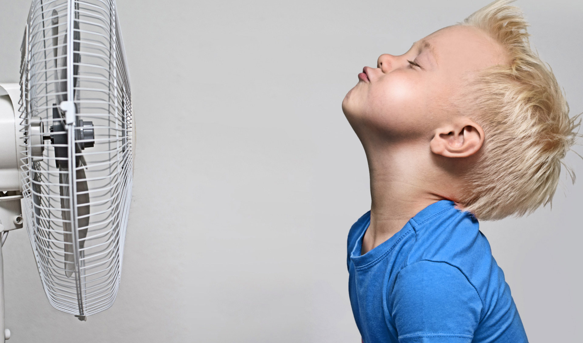 Progressive-HVAC-Hero-Boy-With-Fan | Progressive Heating and Air